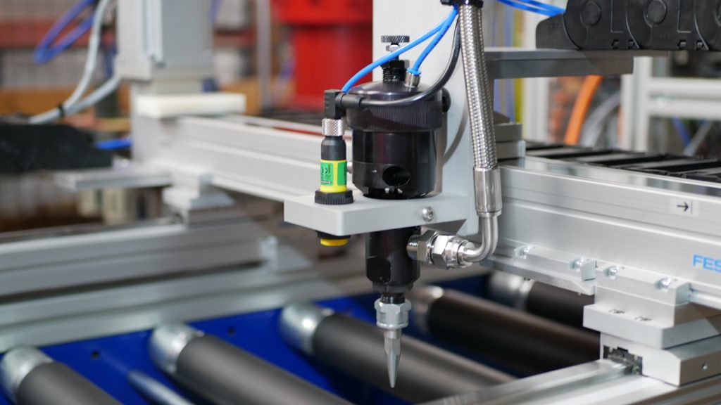 Automated Adhesive Dispense SYSTEMS - Grunfeld Automated Adhesive Dispense SYSTEMS - Grunfeld